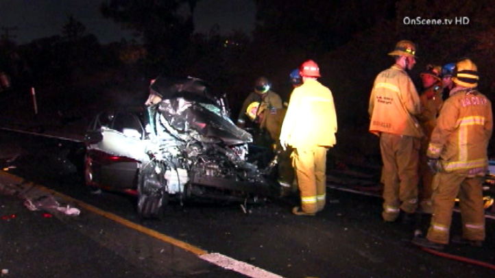 Two Killed When Big Rig Crashes Into Stalled Vehicle On 405 Freeway