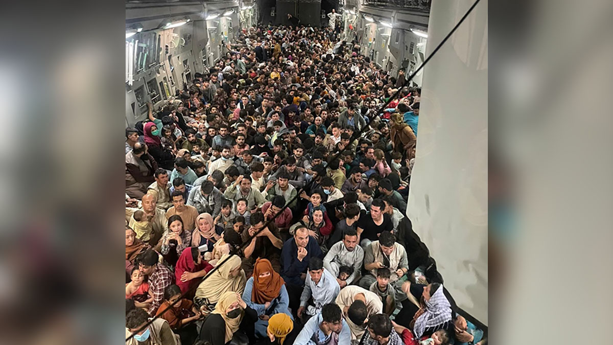 Picture Shows 640 Afghan Refugees Fleeing Kabul in US Cargo Plane – NBC ...