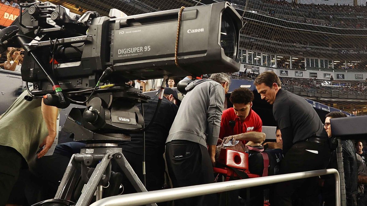 Yes Network Cameraman Carted Off After Getting Hit By Errant Throw