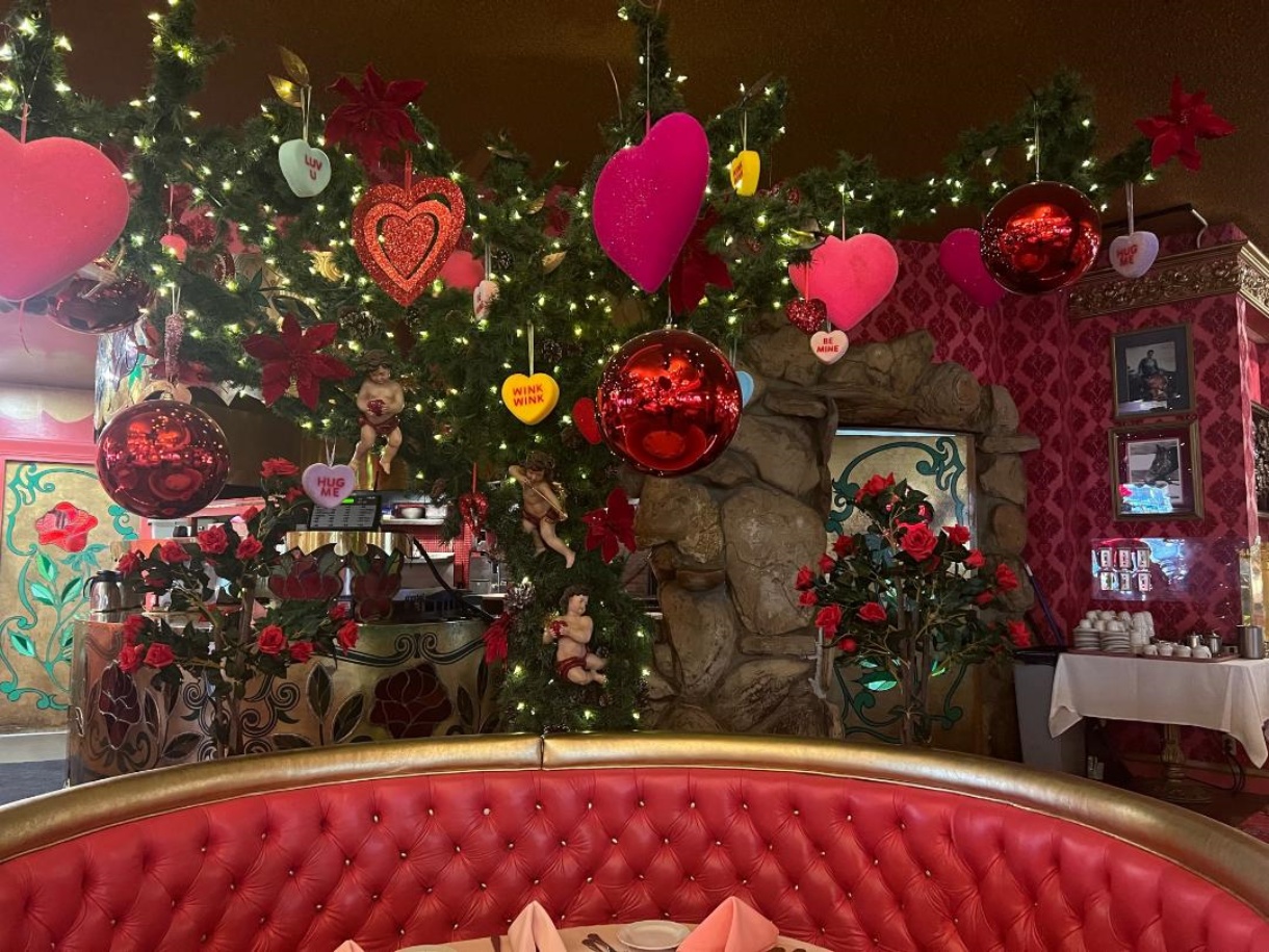 Dine under oversized ‘candy’ hearts at that eye-popping palace o’ pink ...