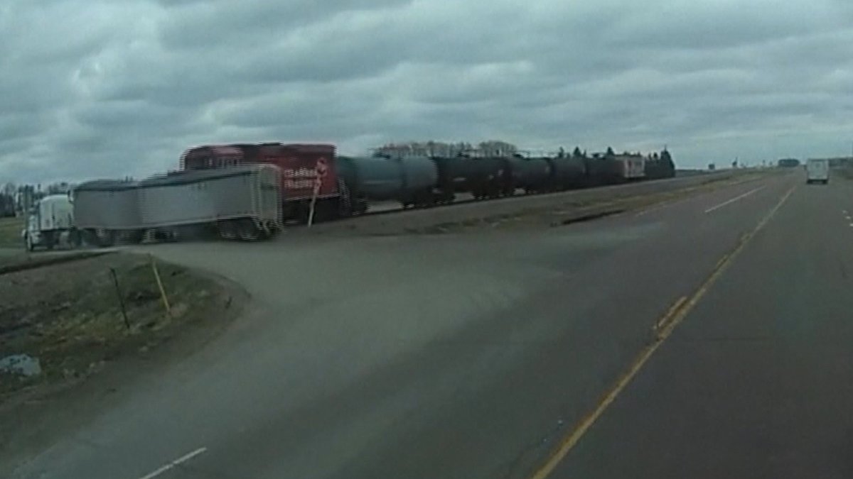 WATCH: Train crashes into tractor trailer crossing tracks in Minnesota ...