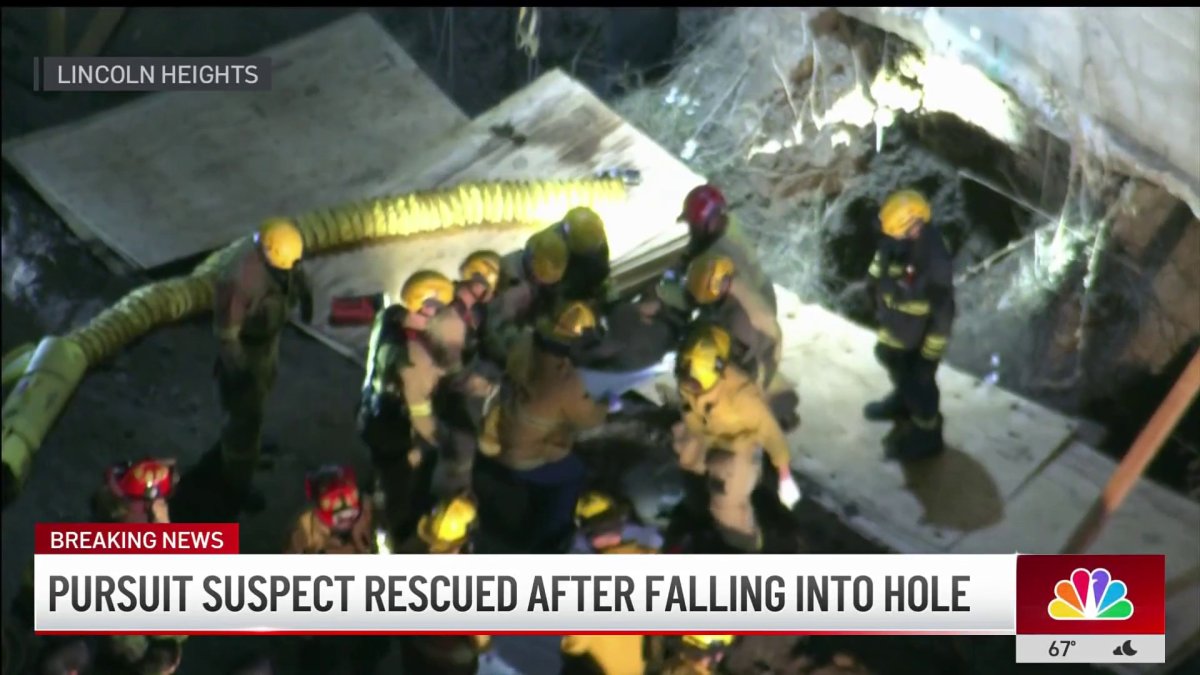 Pursuit suspect rescued after falling into hole at Lincoln Heights ...