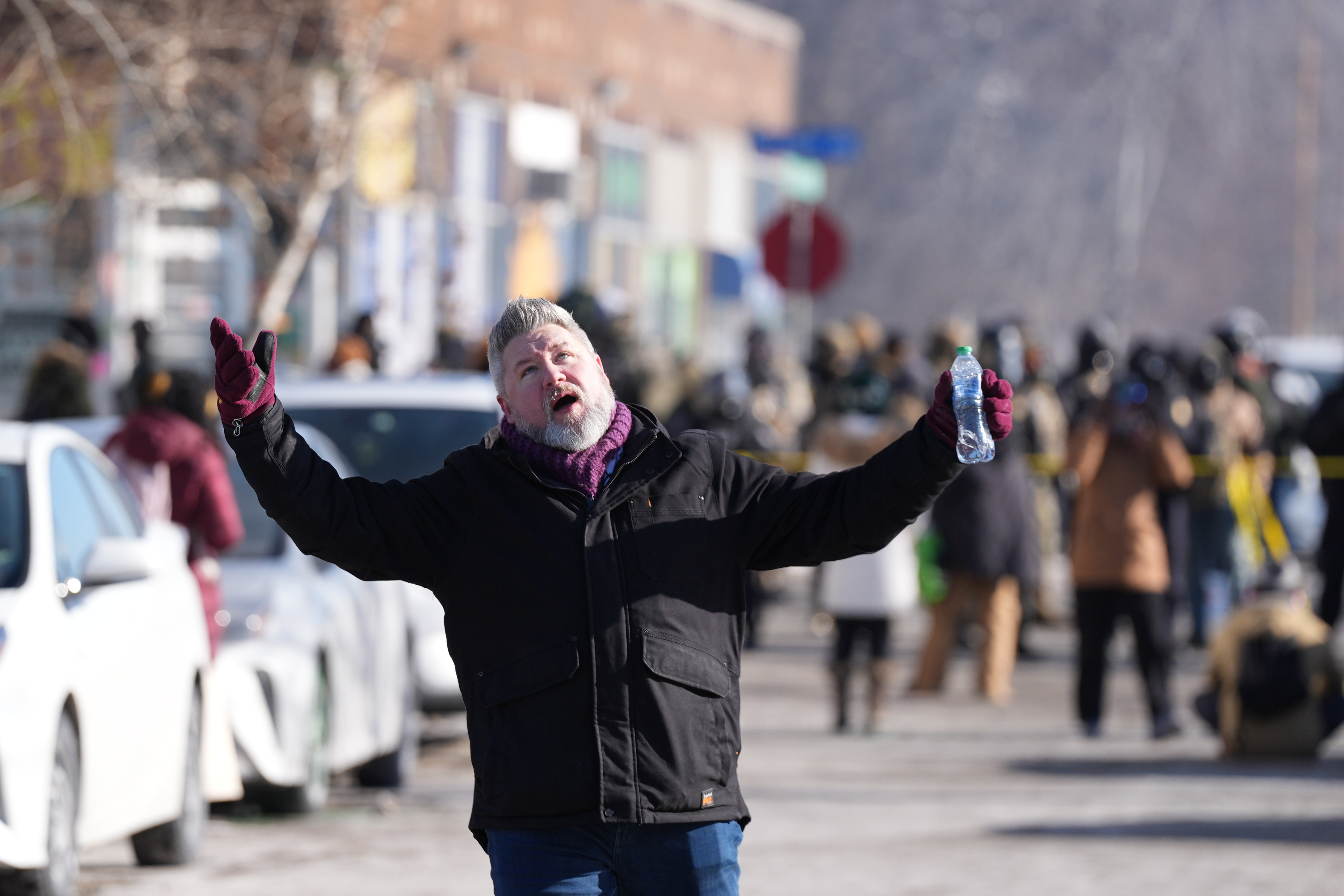 Photos: Officers react with crown after man killed in Minneapolis – NBC ...