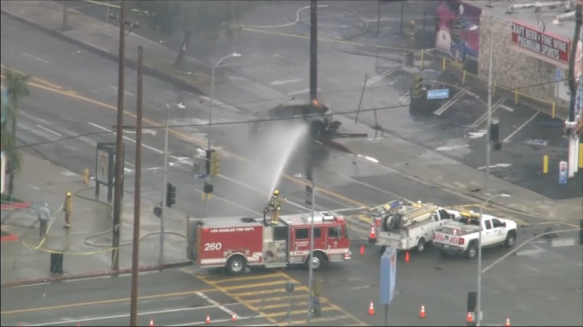 Fiery EV crash into a power pole shuts down North Hollywood ...